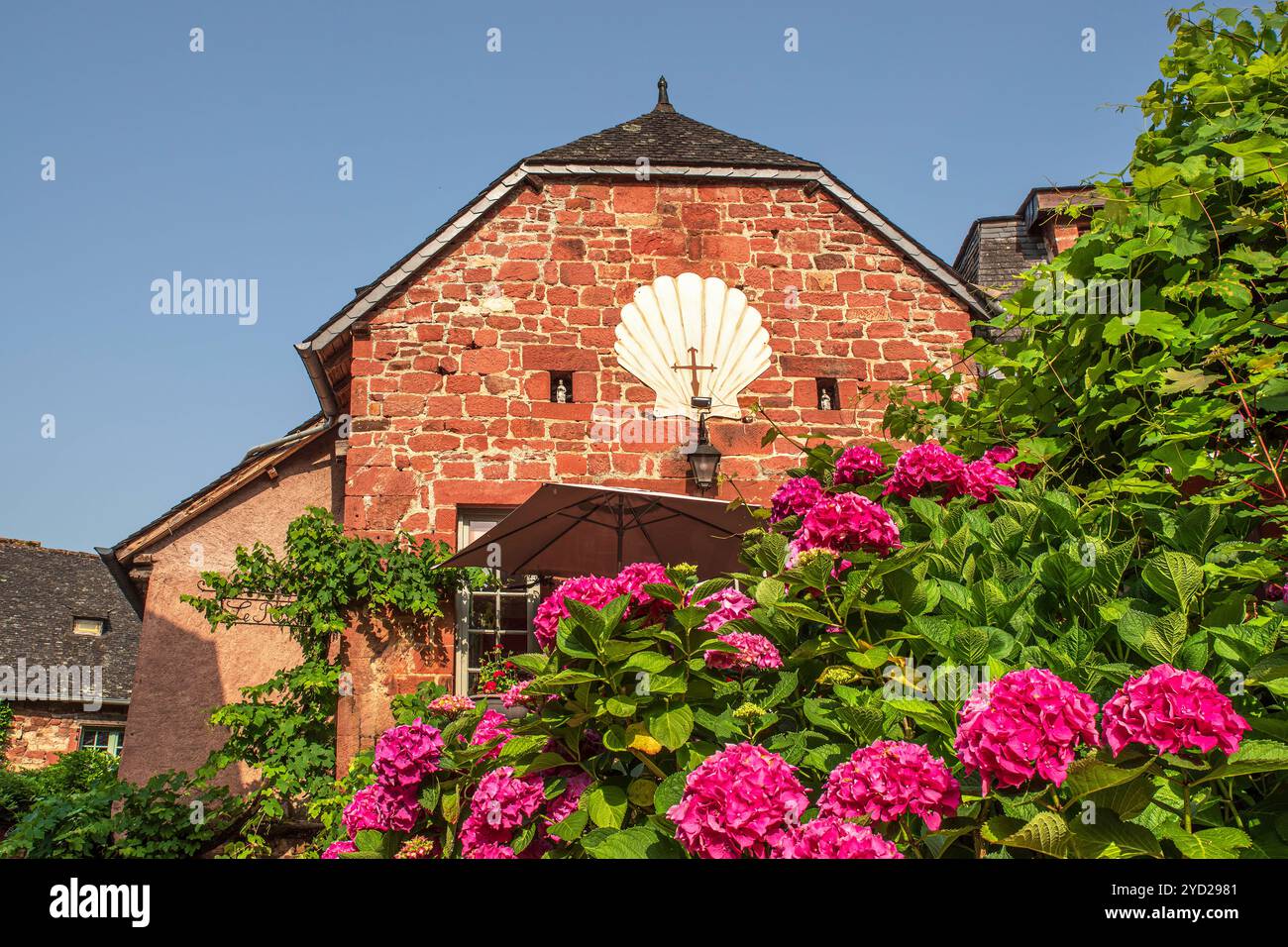Red stone architecture in the village of Colonges la rouge in Corrèze ...