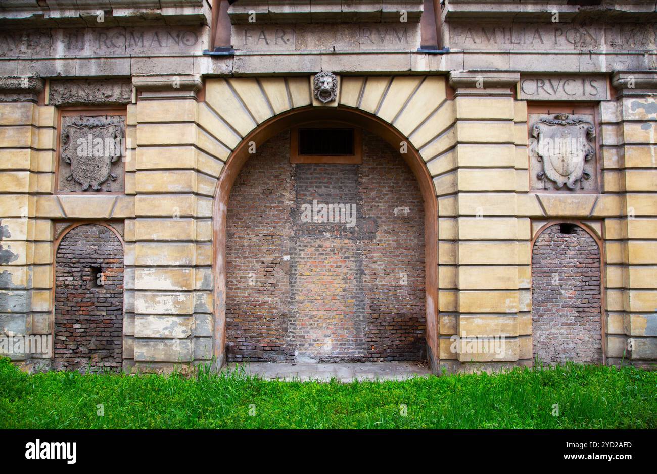 Photograph of an ancient city gate embedded in historic walls ...
