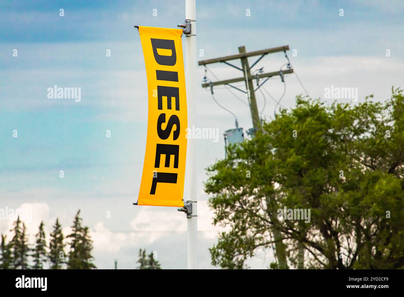 DIESEL fuel gasoline station yellow sign Stock Photo - Alamy
