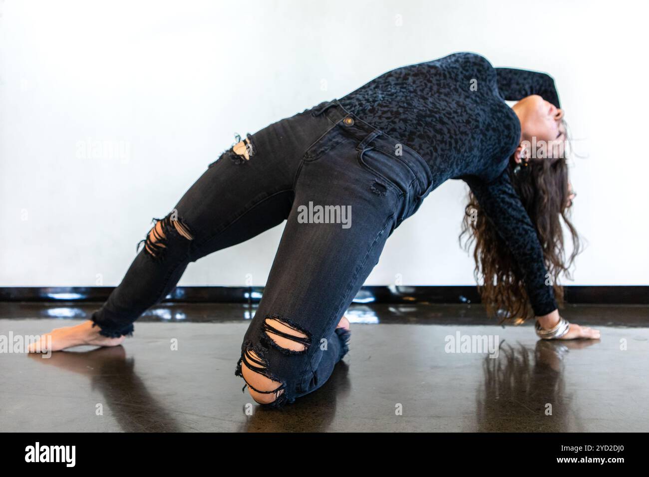 Healthy woman during flowing yoga class Stock Photo - Alamy