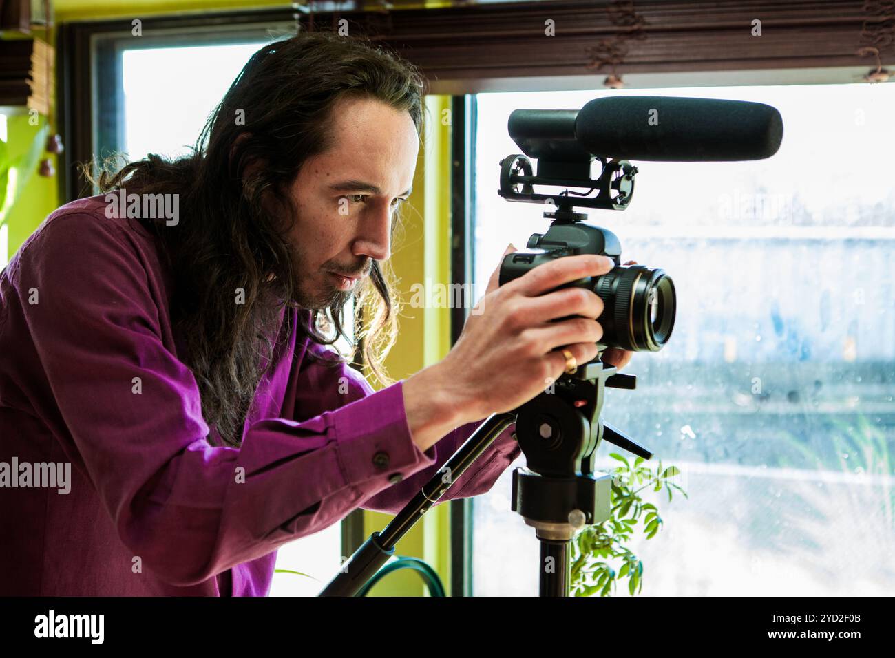 Filming hand-held camera for B-roll video Stock Photo - Alamy
