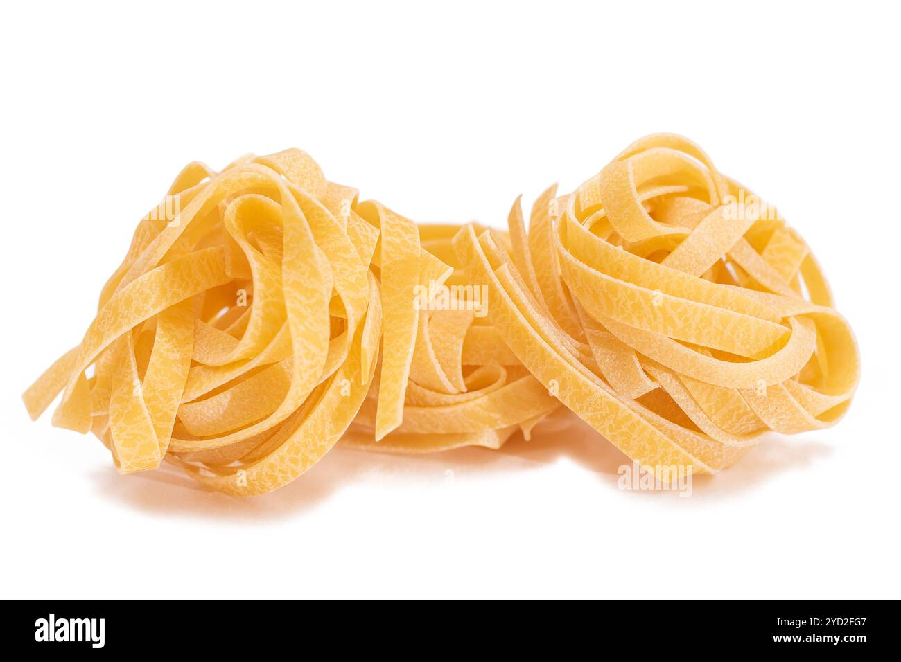 Three Classic Italian Raw Egg Fettuccine - Isolated on White Background ...