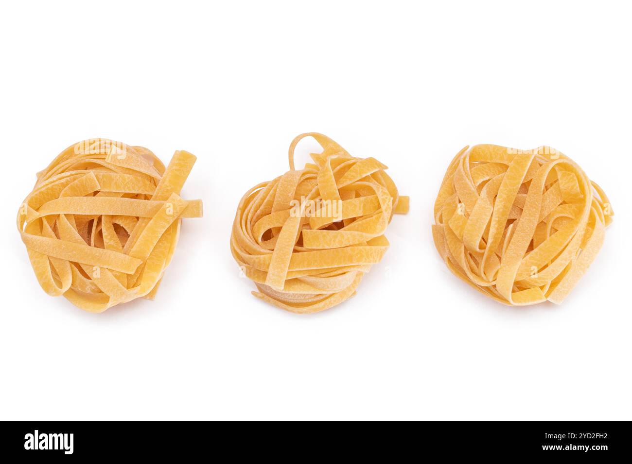 Three Classic Italian Raw Egg Fettuccine - Isolated on White Background ...