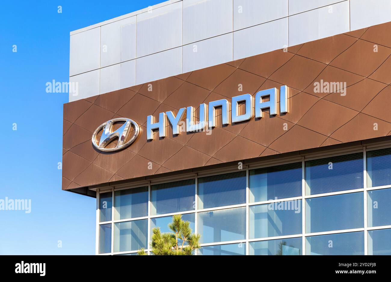 Hyundai dealership logo on the facade of official dealer Stock Photo ...