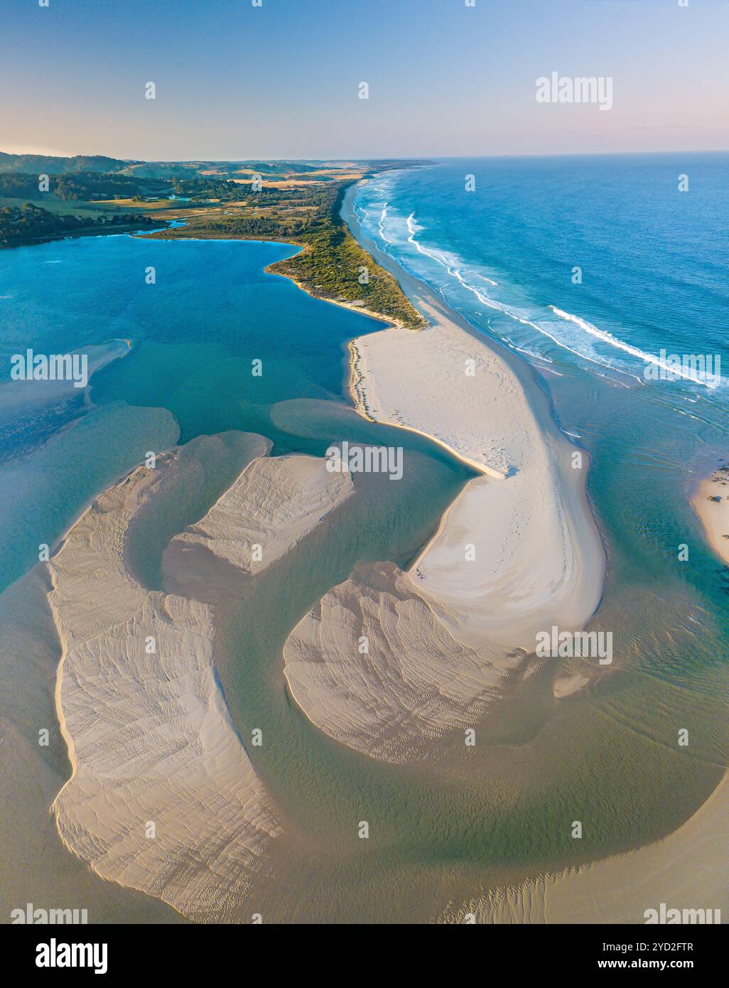 Aerial view of sand patterns in the shallow waters of the ocean inlet ...