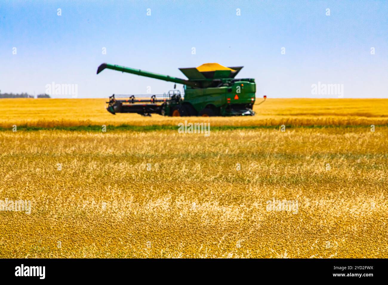 Harvester machine in field work hi-res stock photography and images - Alamy