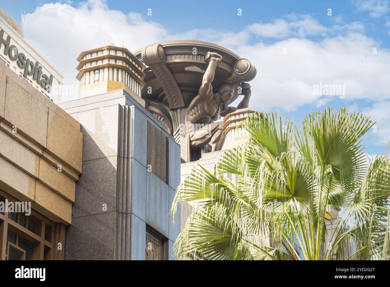 An art deco sculpture of giants holding a bowl on the Parkview Square ...