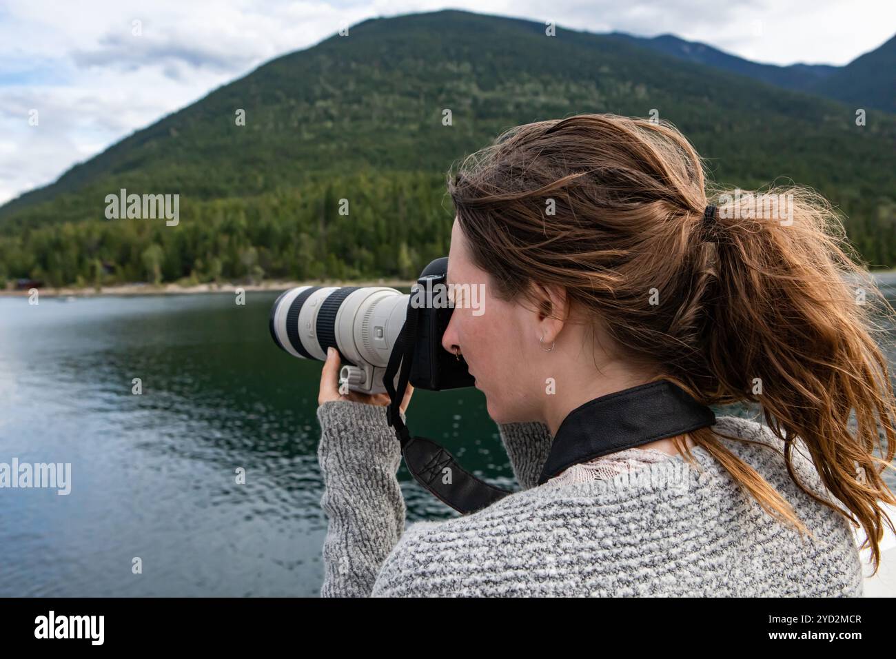 Female professional photographer photographing landscapes hi-res stock ...