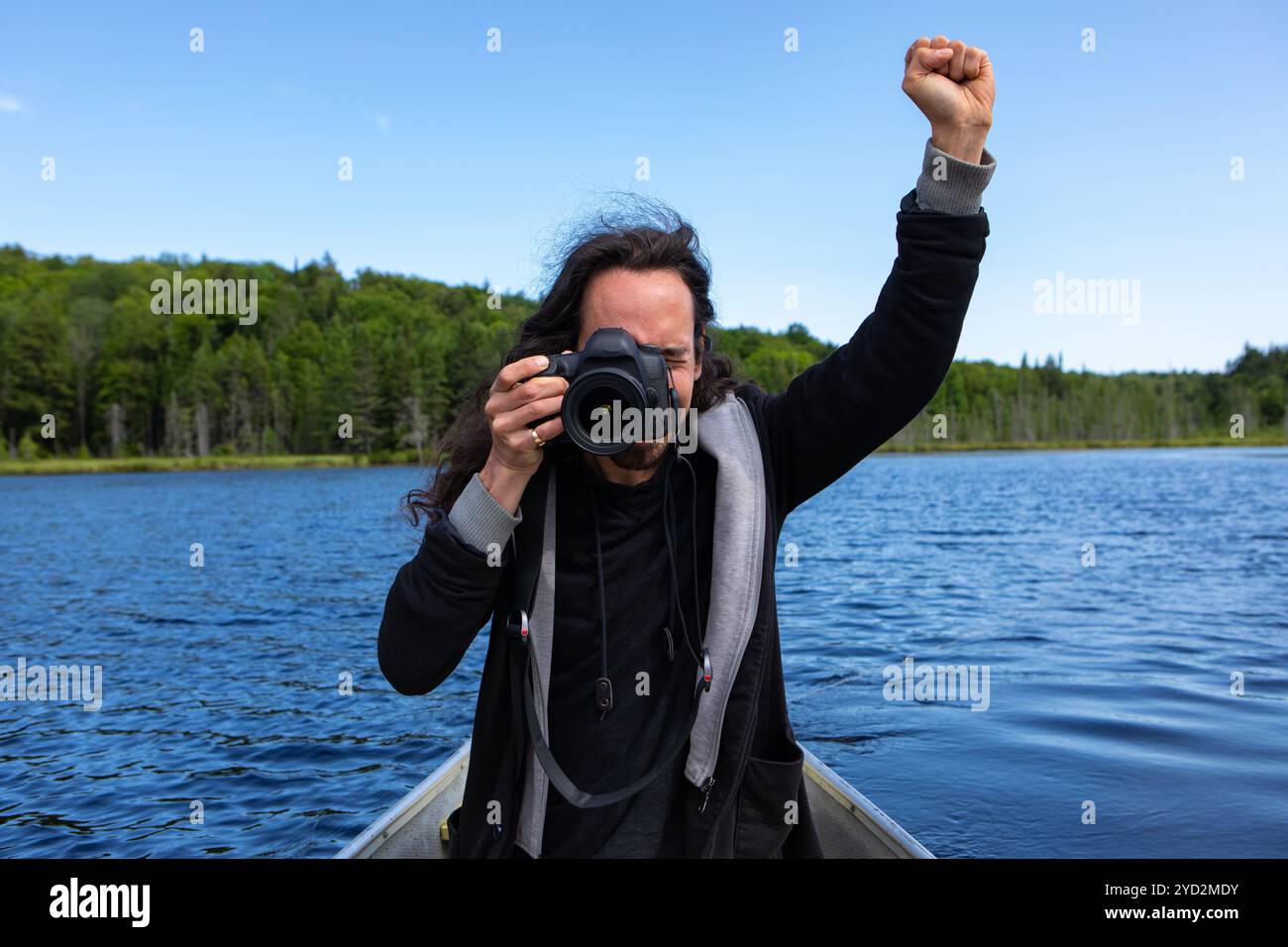 Photographer excited on getting best shot Stock Photo - Alamy