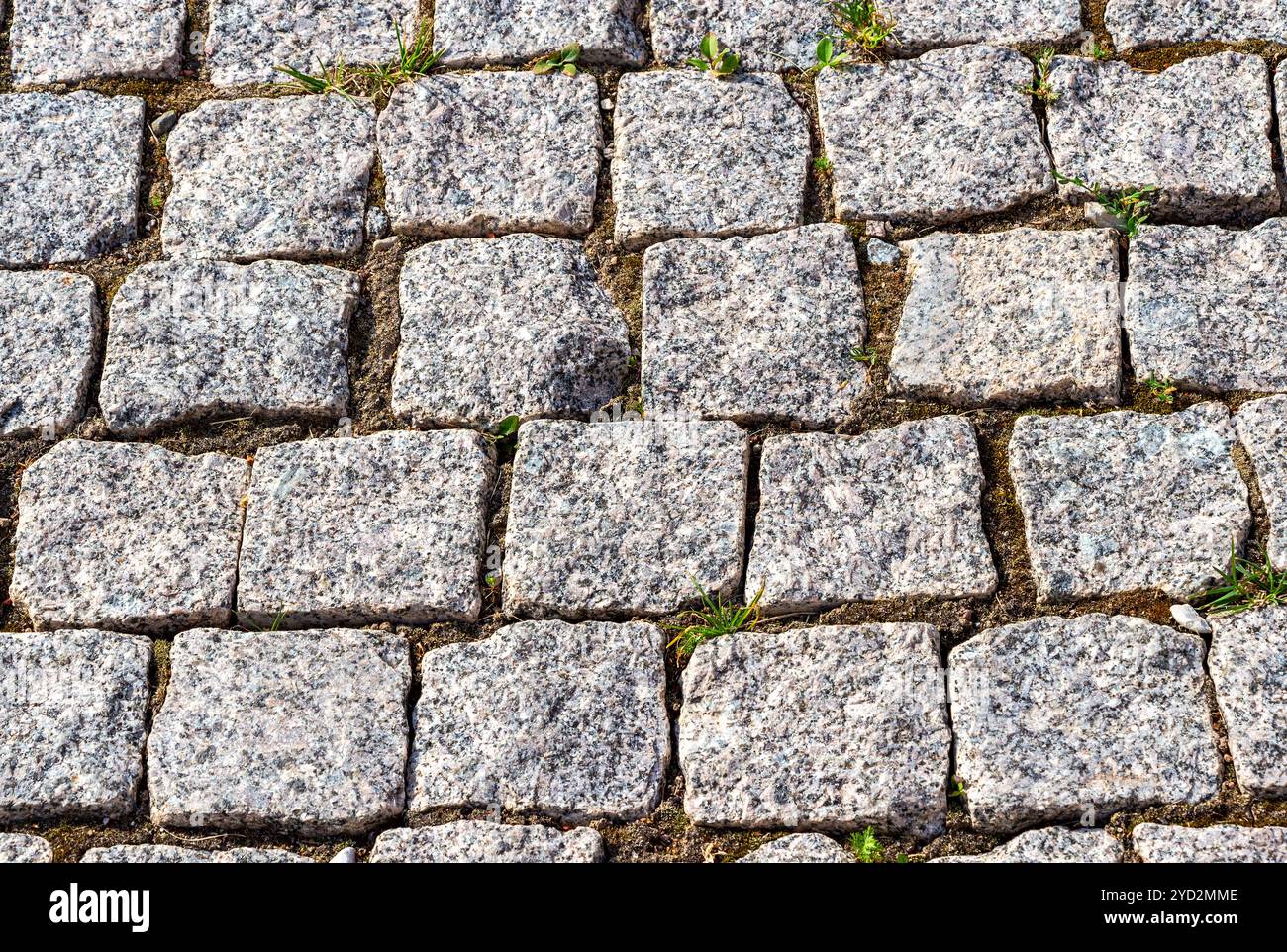 Background of cobblestones making from stone blocks Stock Photo - Alamy