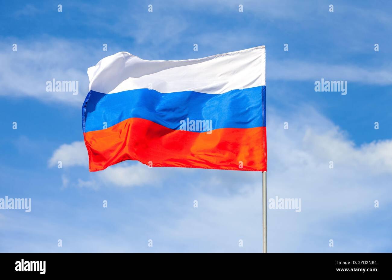 Russian state flag waving against the blue sky Stock Photo - Alamy