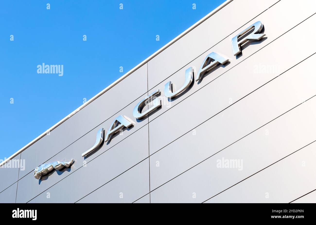 Jaguar dealership sign on the wall Stock Photo - Alamy