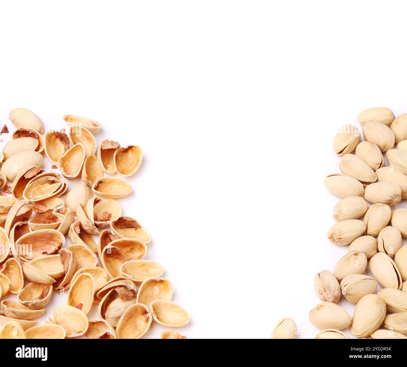 Pistachios and shells. Frame. On a white background Stock Photo - Alamy