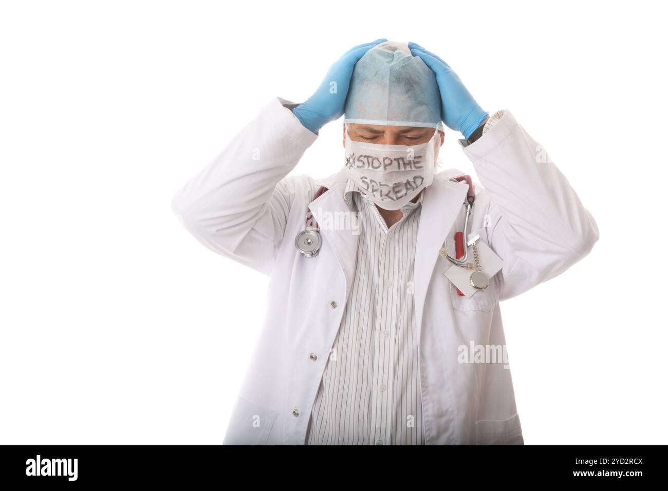 Anguished overwhelmed doctor surgeon during virus pandemic Stock Photo ...