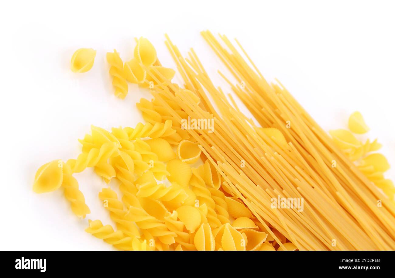 Yellow Italian pasta in different forms, isolated on white background ...
