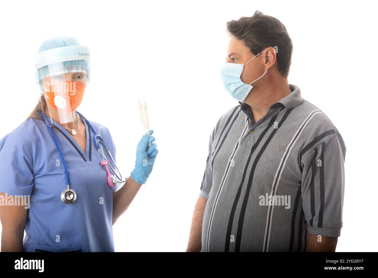 Healthcare worker in PPE holding sterile swabs for nose and throat to ...