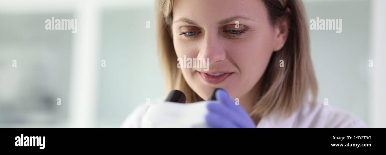 Smiling scientist looks in hi-res stock photography and images - Alamy
