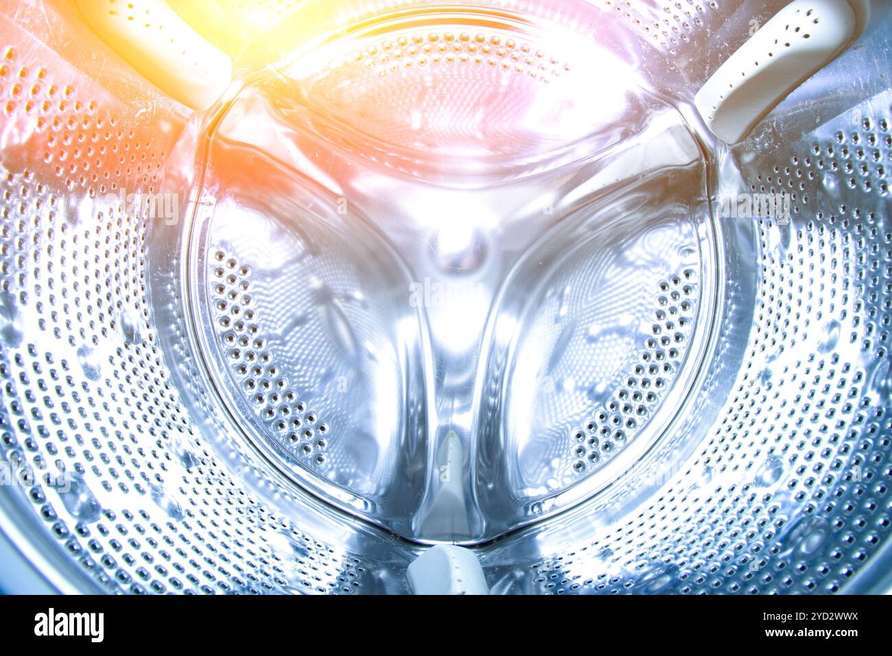 Inside the drum of the washing machine. Steel drum open. Closeup ...