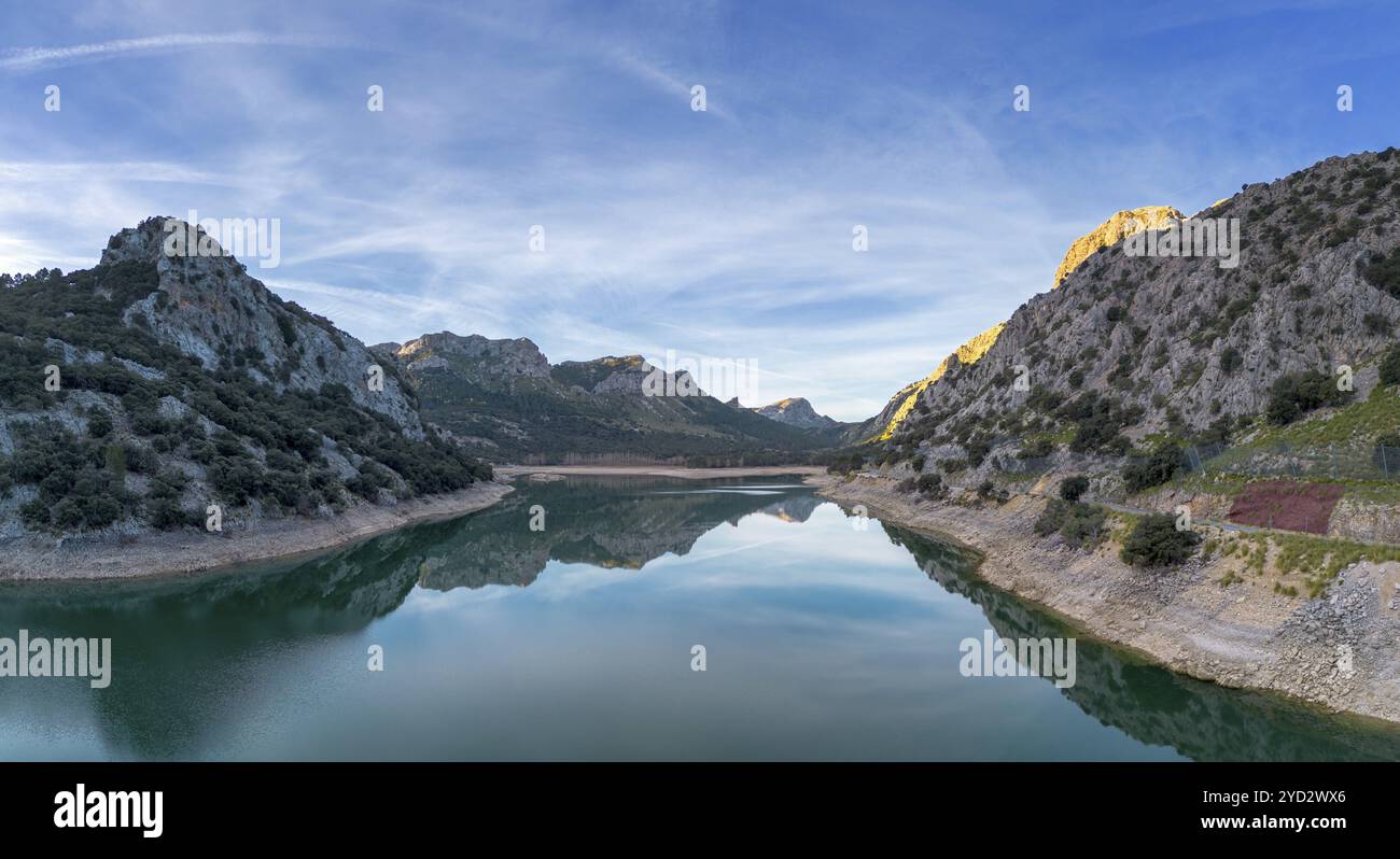 An aerial view of the picturesque Gorg Blau mountain lake and reservoir ...