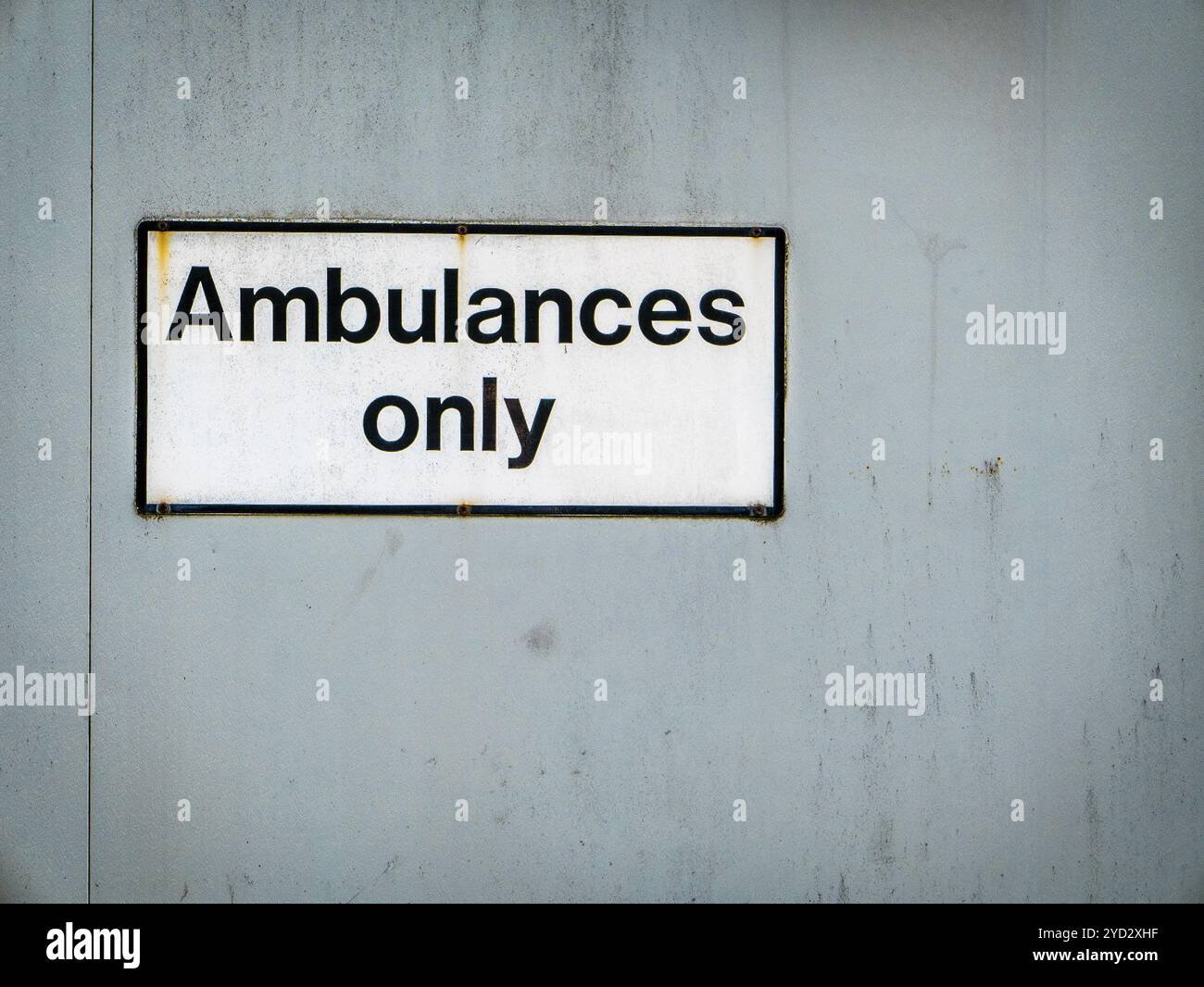 A Grungy Ambulances Only Sign At A Hospital Emergency Room Stock Photo ...