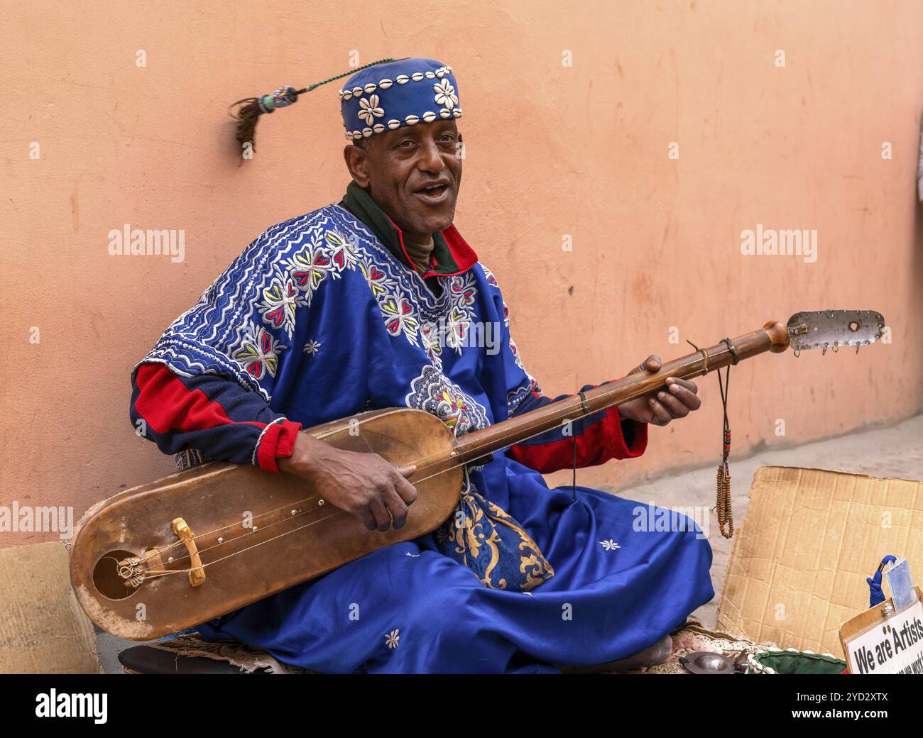 Marrakesh, Morocco, 23 March, 2024: street musician playing a West ...