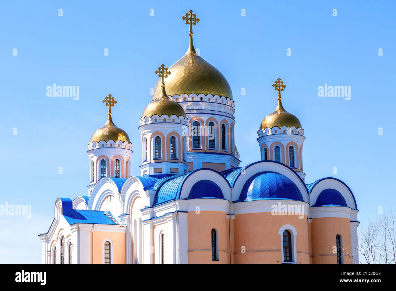 Golden domes of orthodox cathedral against the blue sky background ...