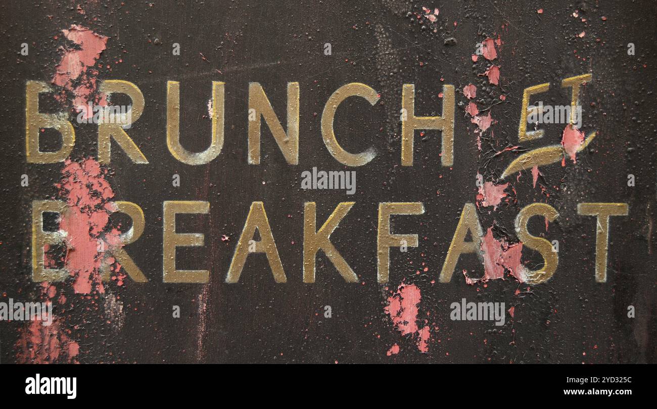 A Grungy French Brunch And Breakfast Sign Outside A Restaurant Stock ...