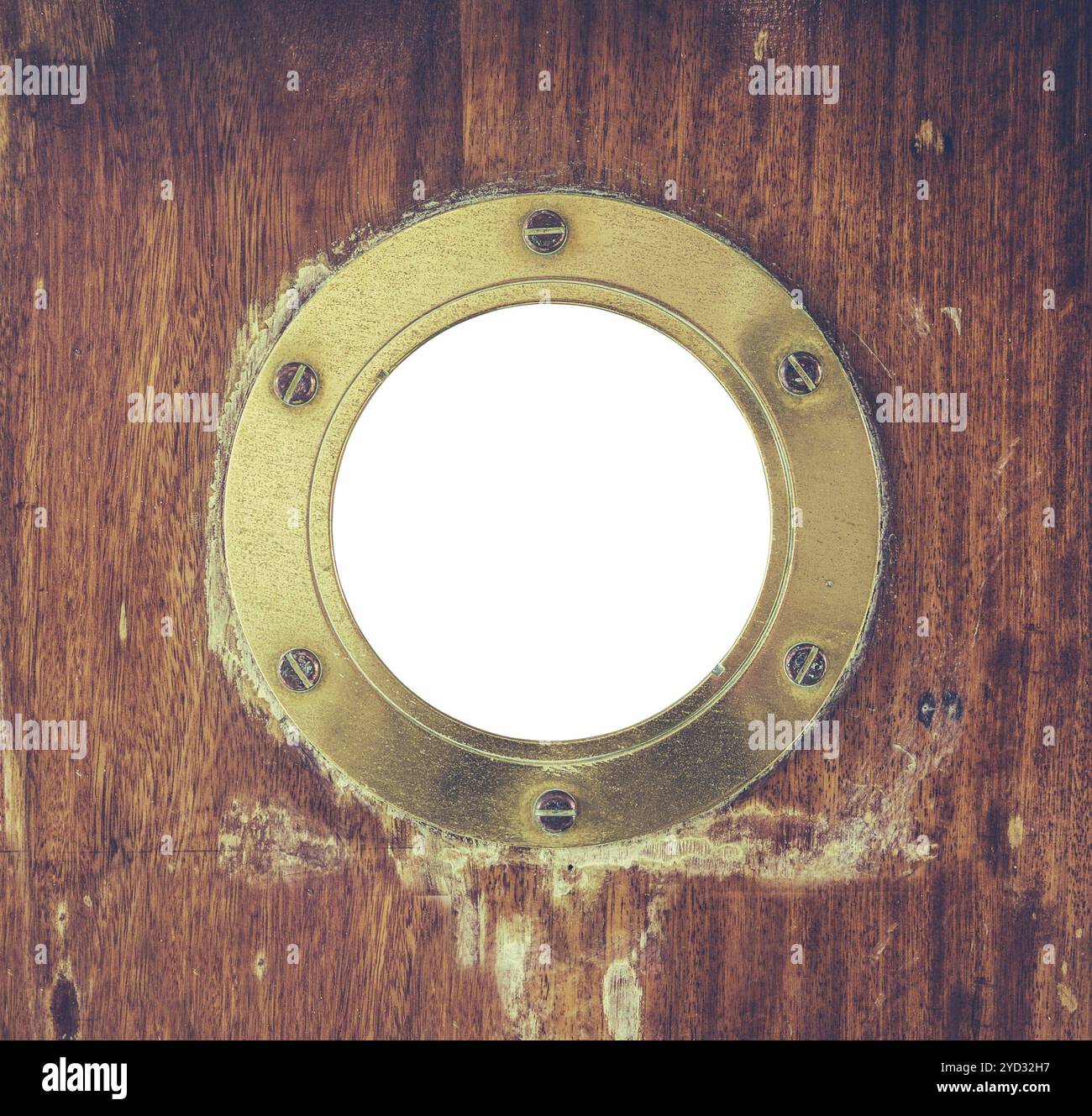 A Vintage Brass Or Bronze Porthole In A Ship's Door With Isolated ...