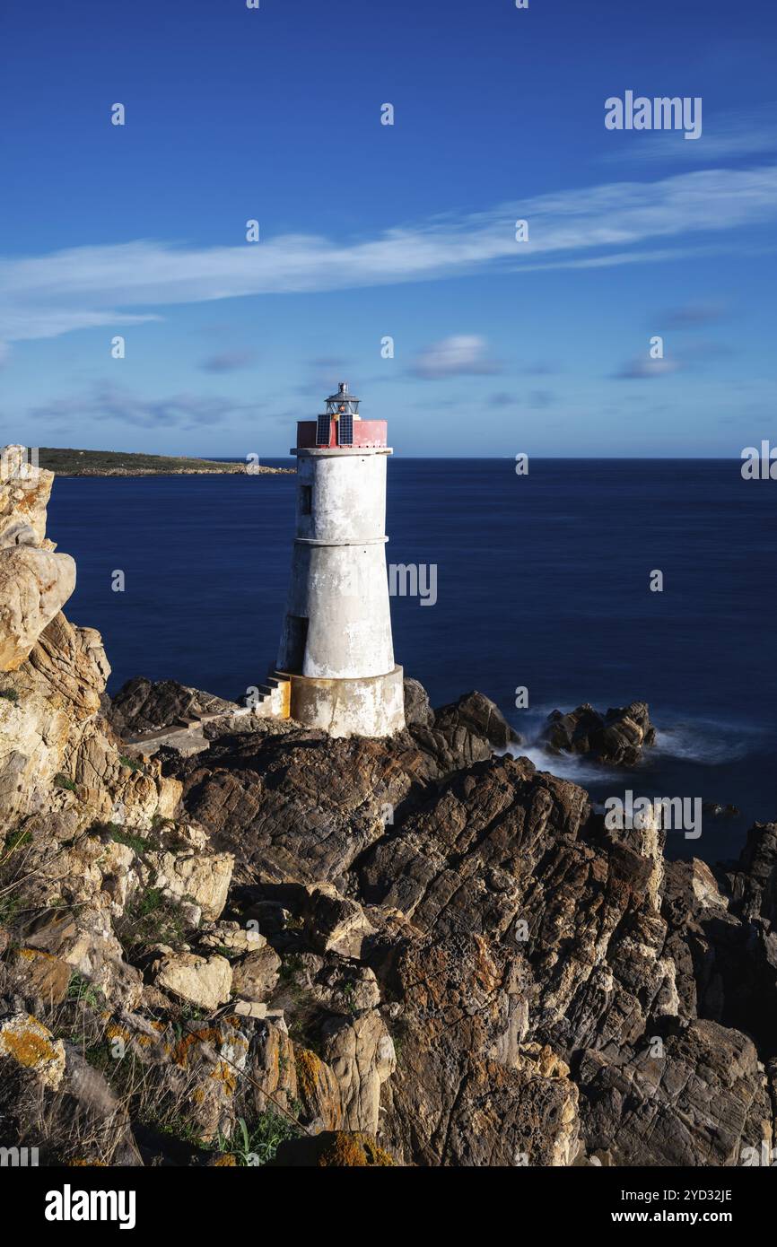 A vertical view of the old Capo Ferro Lighthouse in Sardinia Stock ...