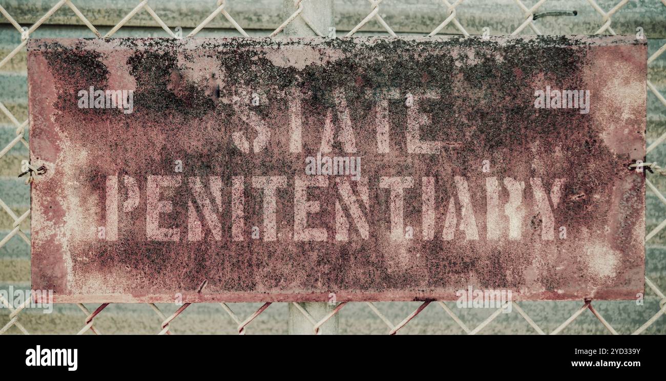 Retro Filtered Photo Of Rusty Grungy Old Penitentiary Prison Sign On ...