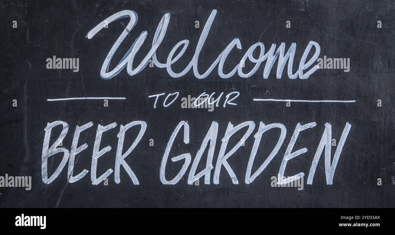 A Blackboard Sign Outside A Bar Or Pub Saying Welcome To Our Beer ...