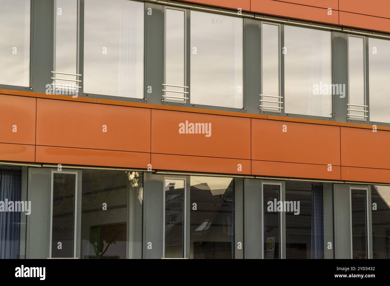 The exterior of a modern office building shows the architectural design ...