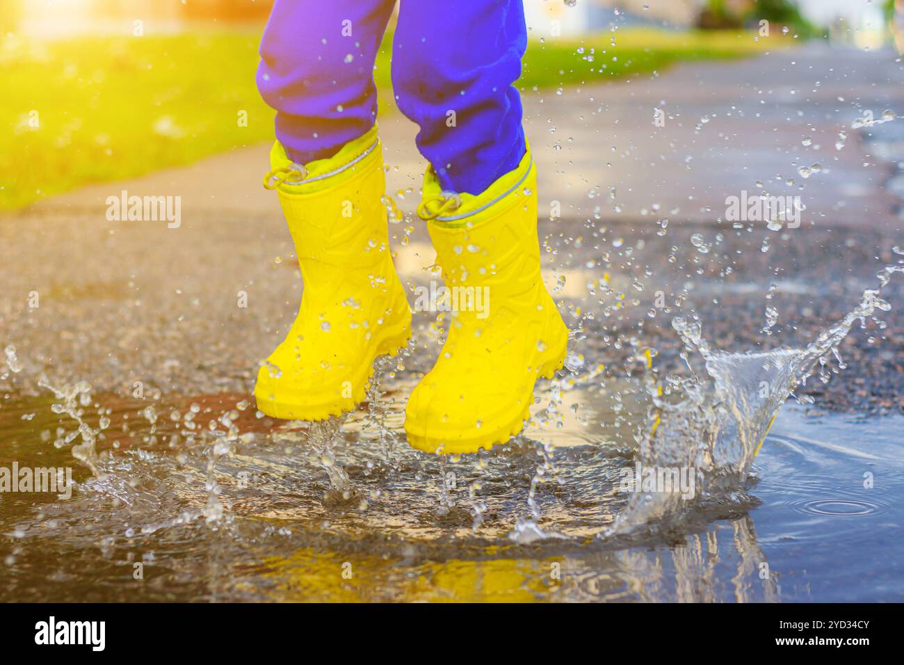 My rubber-booted feet are Bouncing in a puddle. Article about rubber ...