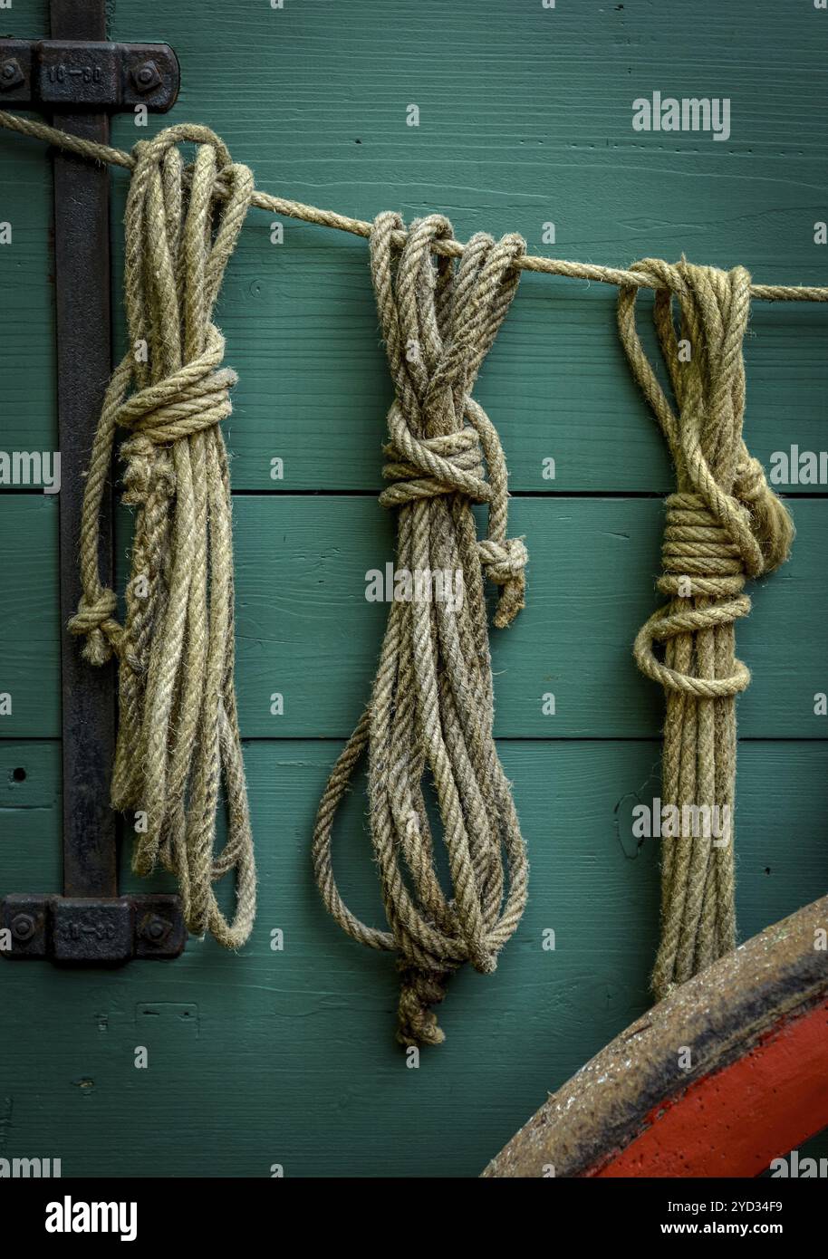 Wild West Scene Of Ropes On The Side Of An Old Wagon Stock Photo - Alamy
