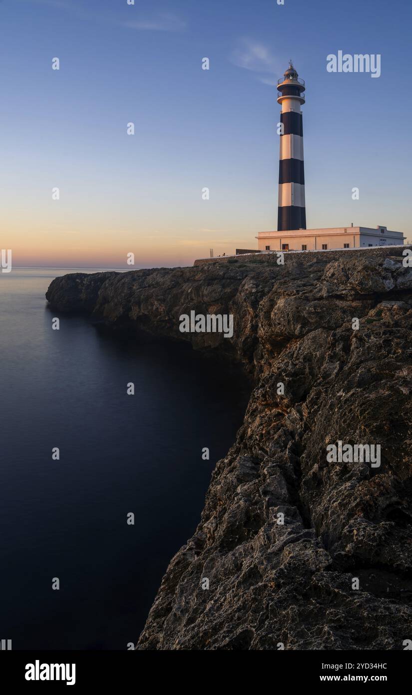 A vertical view of the landmark Cap d'Artrutx lighthouse on Menorca ...