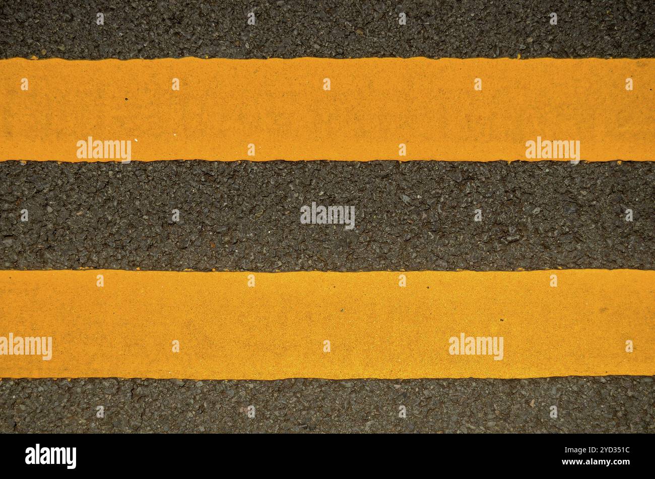 Two yellow lines on road hi-res stock photography and images - Alamy