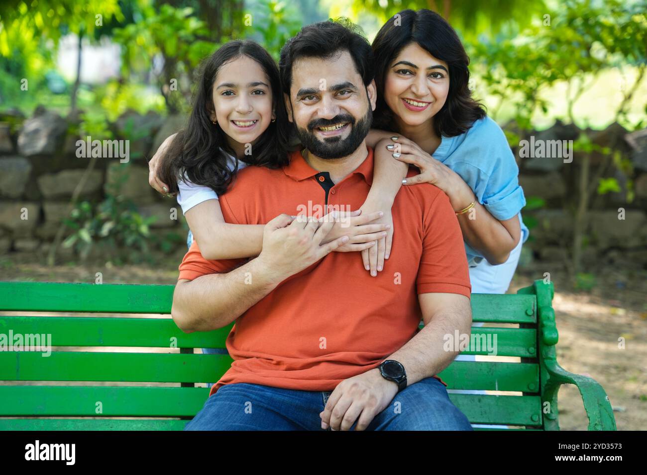 Young happy indian family at summer park together, Parents bonding love ...