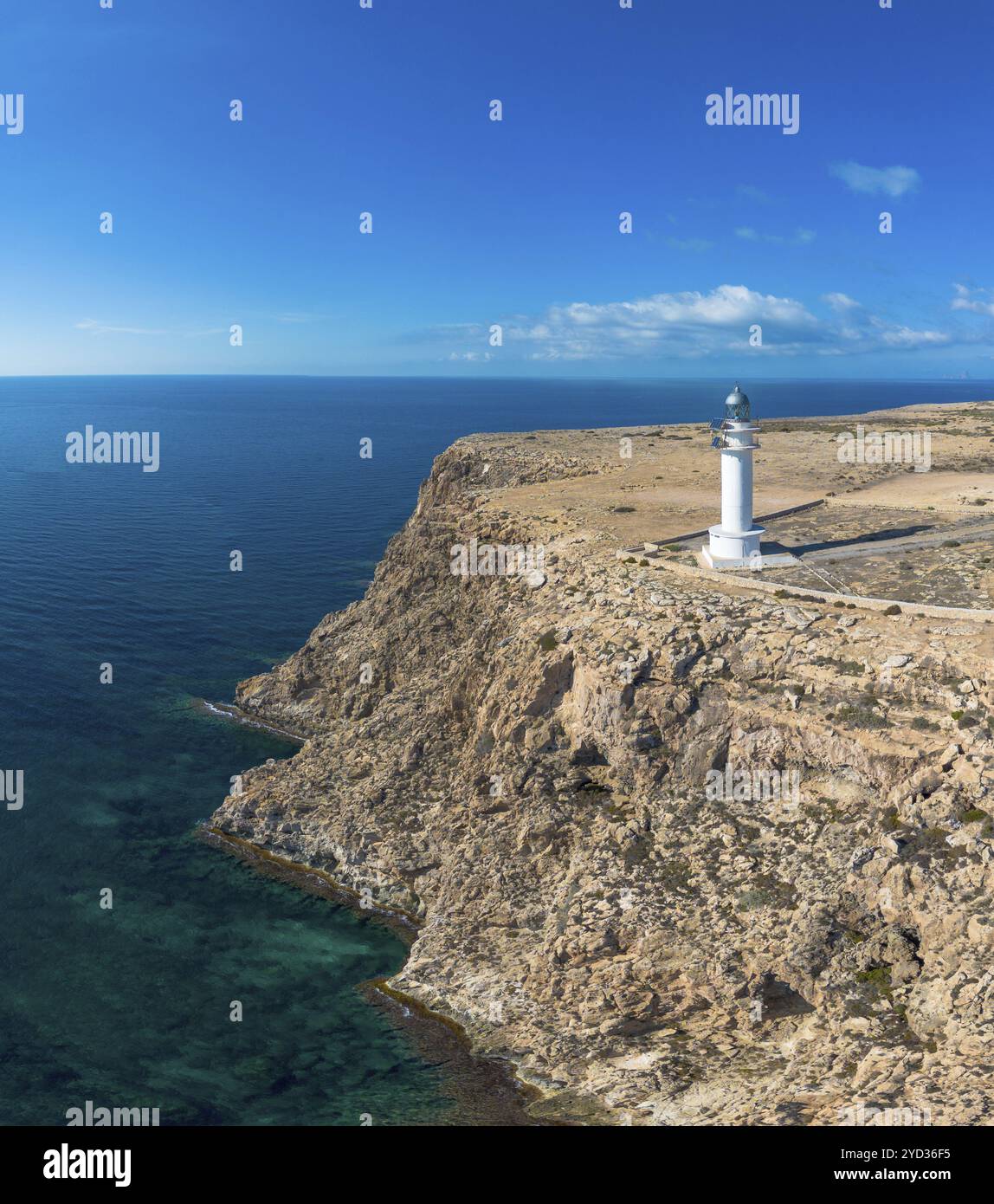 Aerial landscape view of Cap de Barbaria and the landmark lighthouse on ...