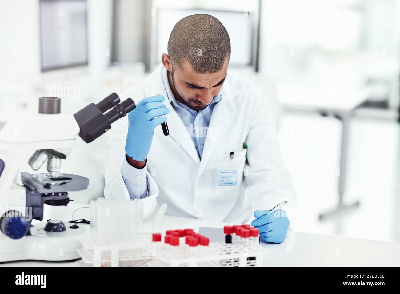 Man, scientist and blood at laboratory with tablet, vial and check ...