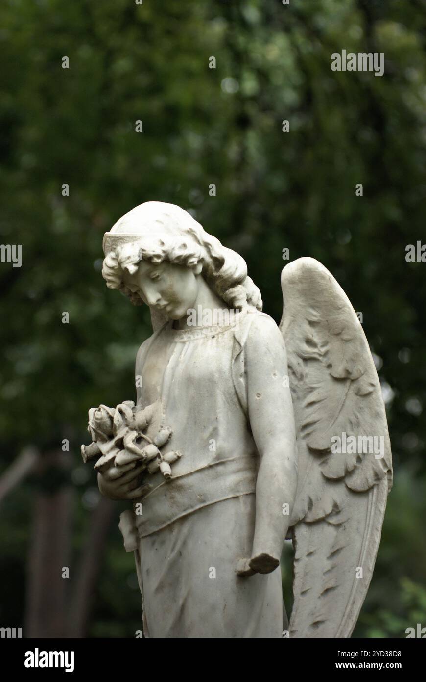 Statue of a grieving angel figure at Taman Prasati museum (museum of ...