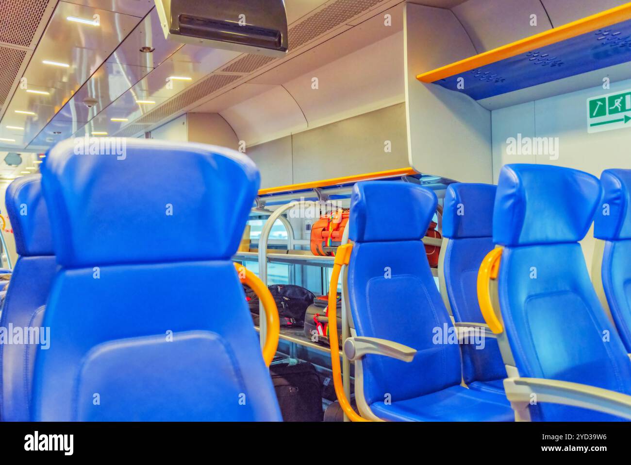 Interior of the high-speed train stand on railways stantion. Nobody ...