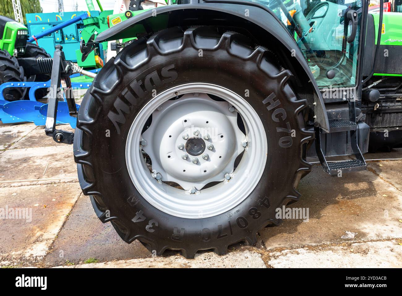 Big wheel of new modern agricultural wheeled tractor Stock Photo - Alamy