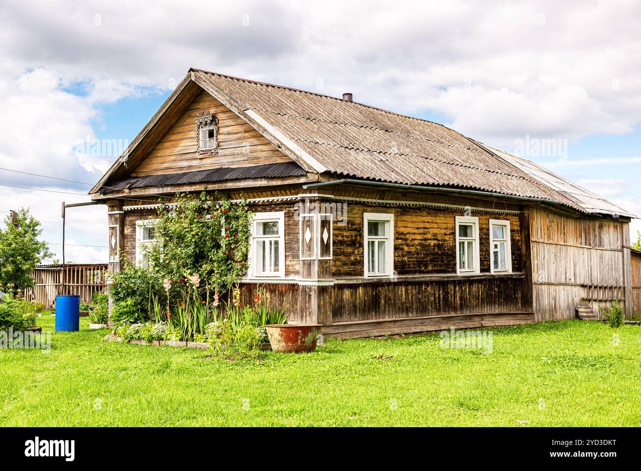 Typical rural wooden house in russian village Stock Photo - Alamy