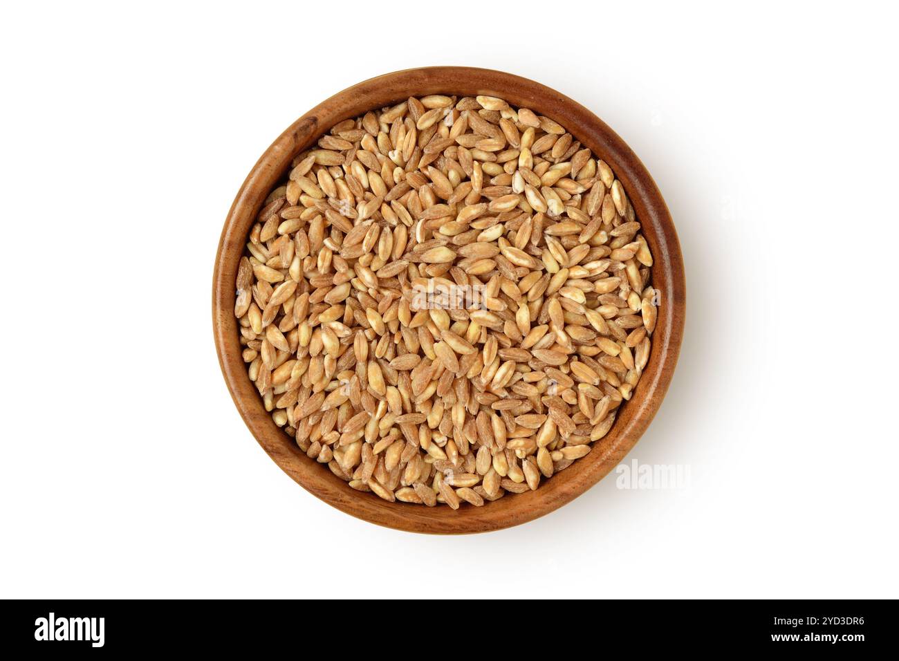 Pearled whole emmer wheat (Farro) in wooden bowl on white background ...