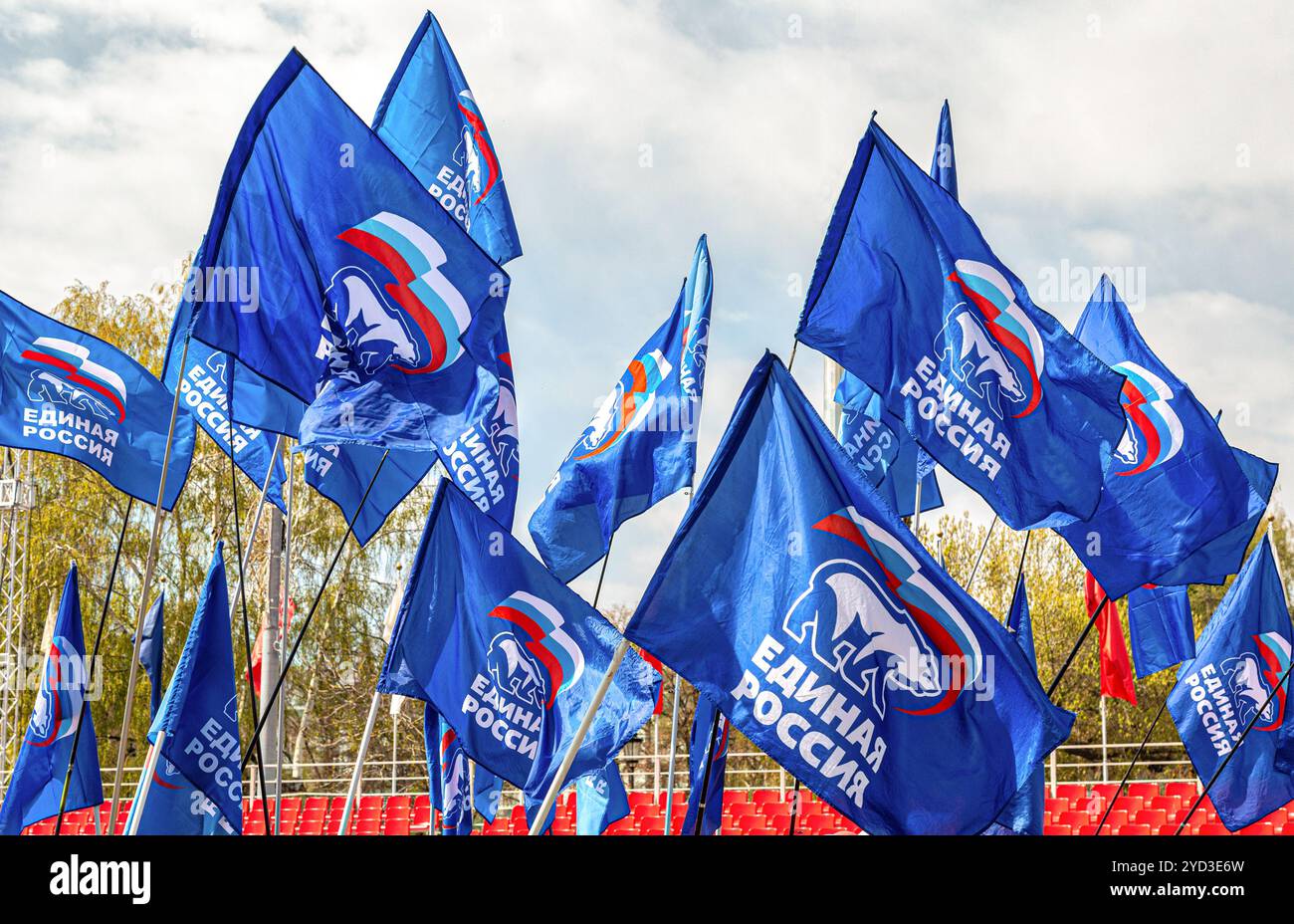 Flags of the party United Russia against the blue sky Stock Photo - Alamy