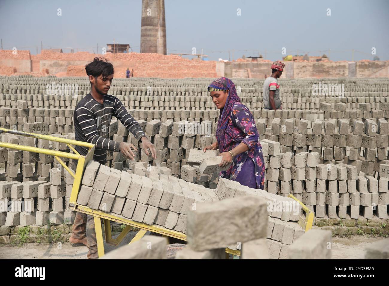 Workers working in a brick field in Dhaka , Bangladesh on October 25 ...