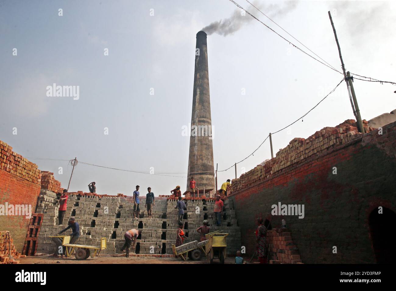 Workers working in a brick field in Dhaka , Bangladesh on October 25 ...