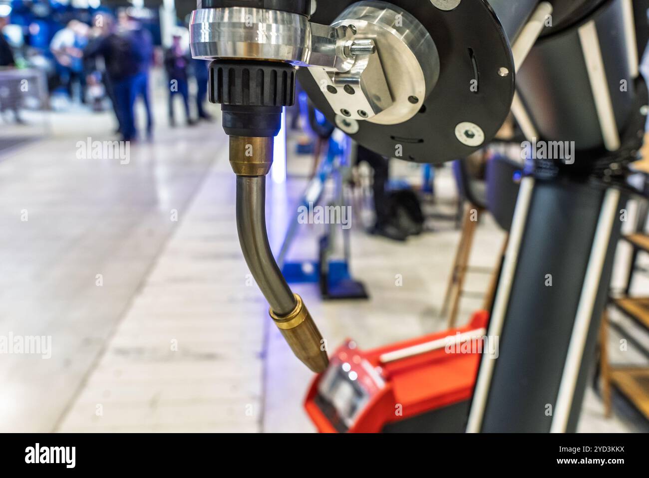 Robot welds steel. Welding head. Welding robot. CNC welding ...