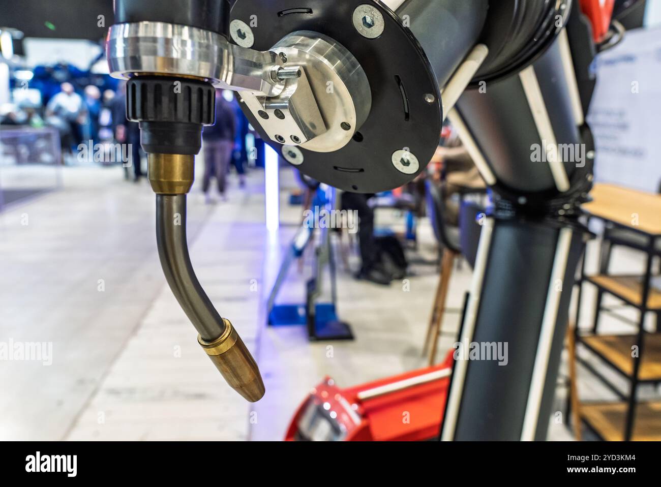 Robot welds steel. Welding head. Welding robot. CNC welding ...