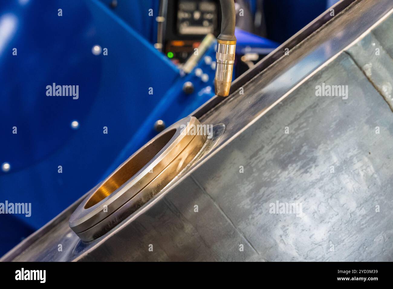 Robot welds steel. Welding head. Welding robot. CNC welding ...